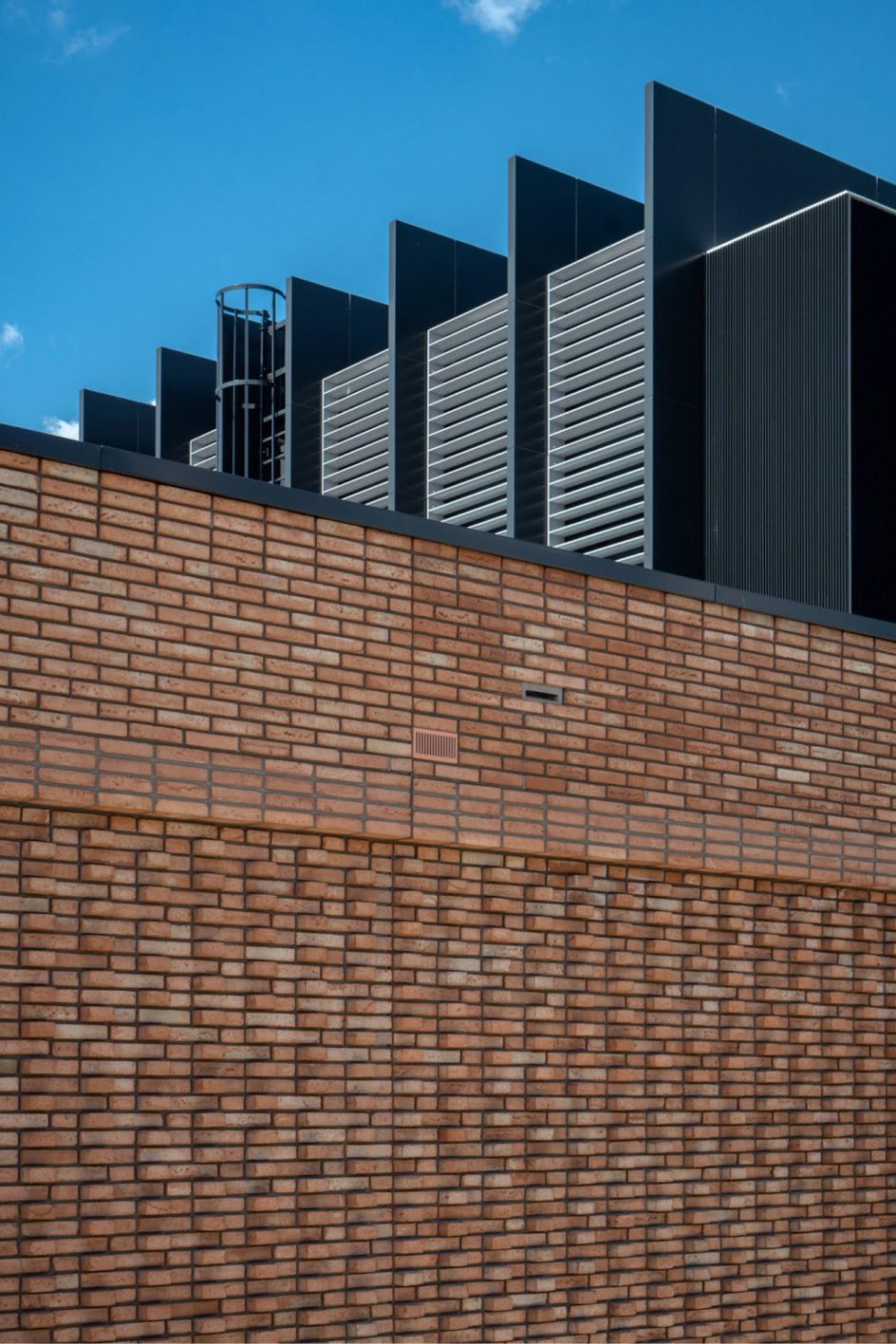 Substation in Orange Brick from Waste in Amsterdam - FRONT®